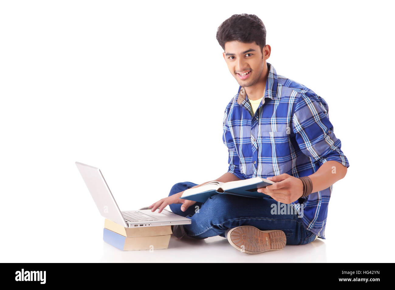 Young Man Using Laptop Stock Photo - Alamy