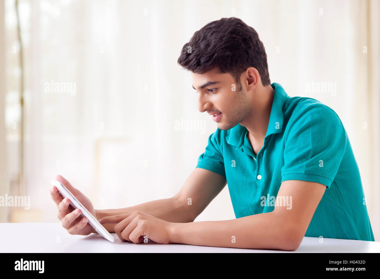 Student using Mobile Phones at the desk Stock Photo - Alamy
