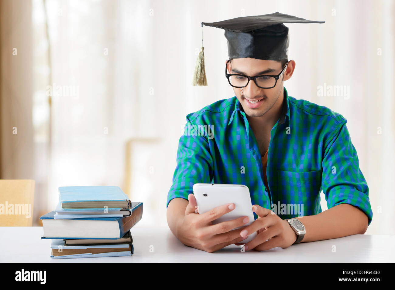 Young student using a tablet Stock Photo - Alamy