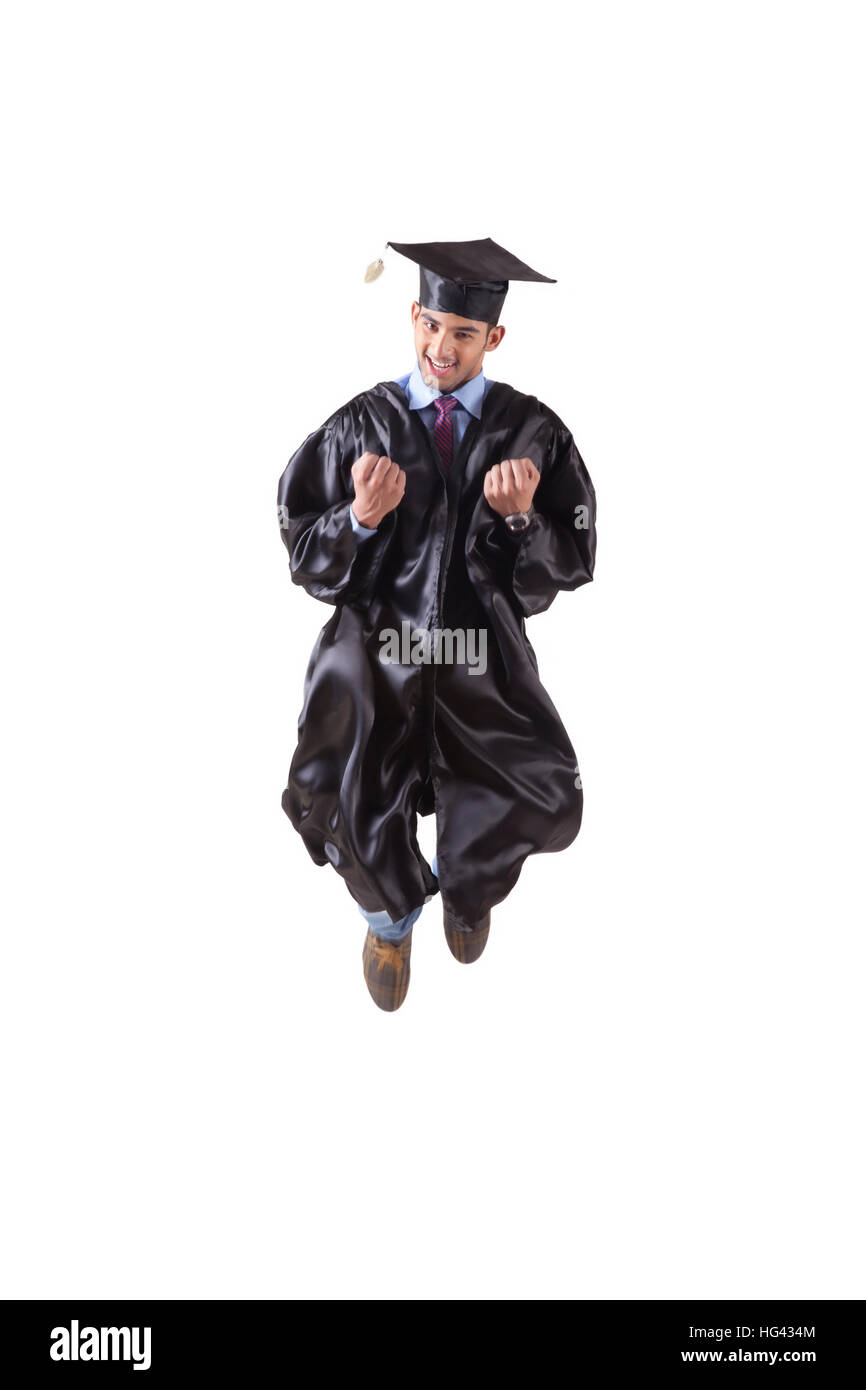 Young Male graduate student jumping out of joy Stock Photo - Alamy