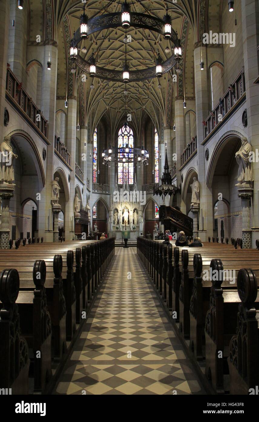Nave of the Castle Church of Wittenberg. On the main door of the church ...