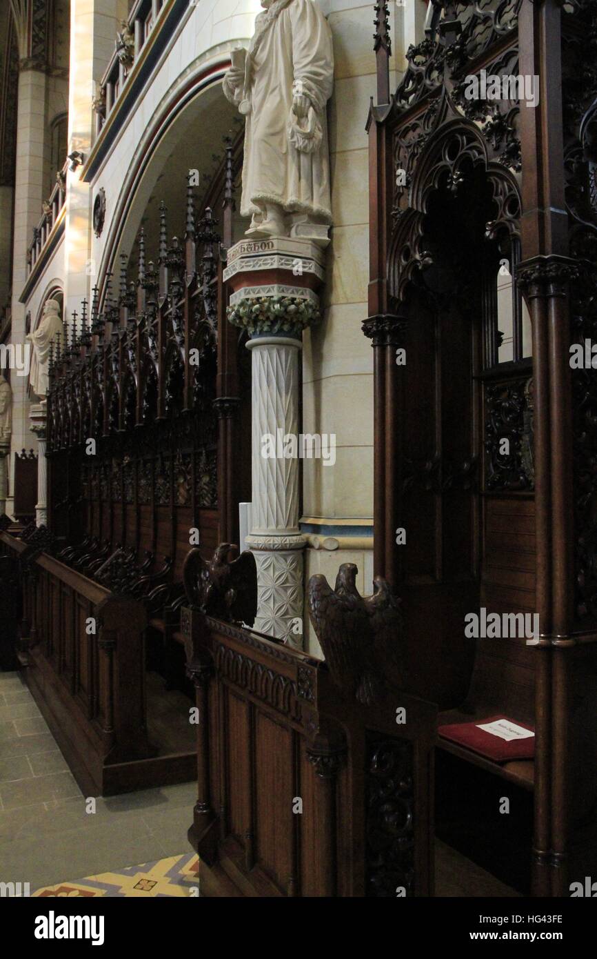 Altar area of the Castle Church in Wittenberg. On the main door of the ...