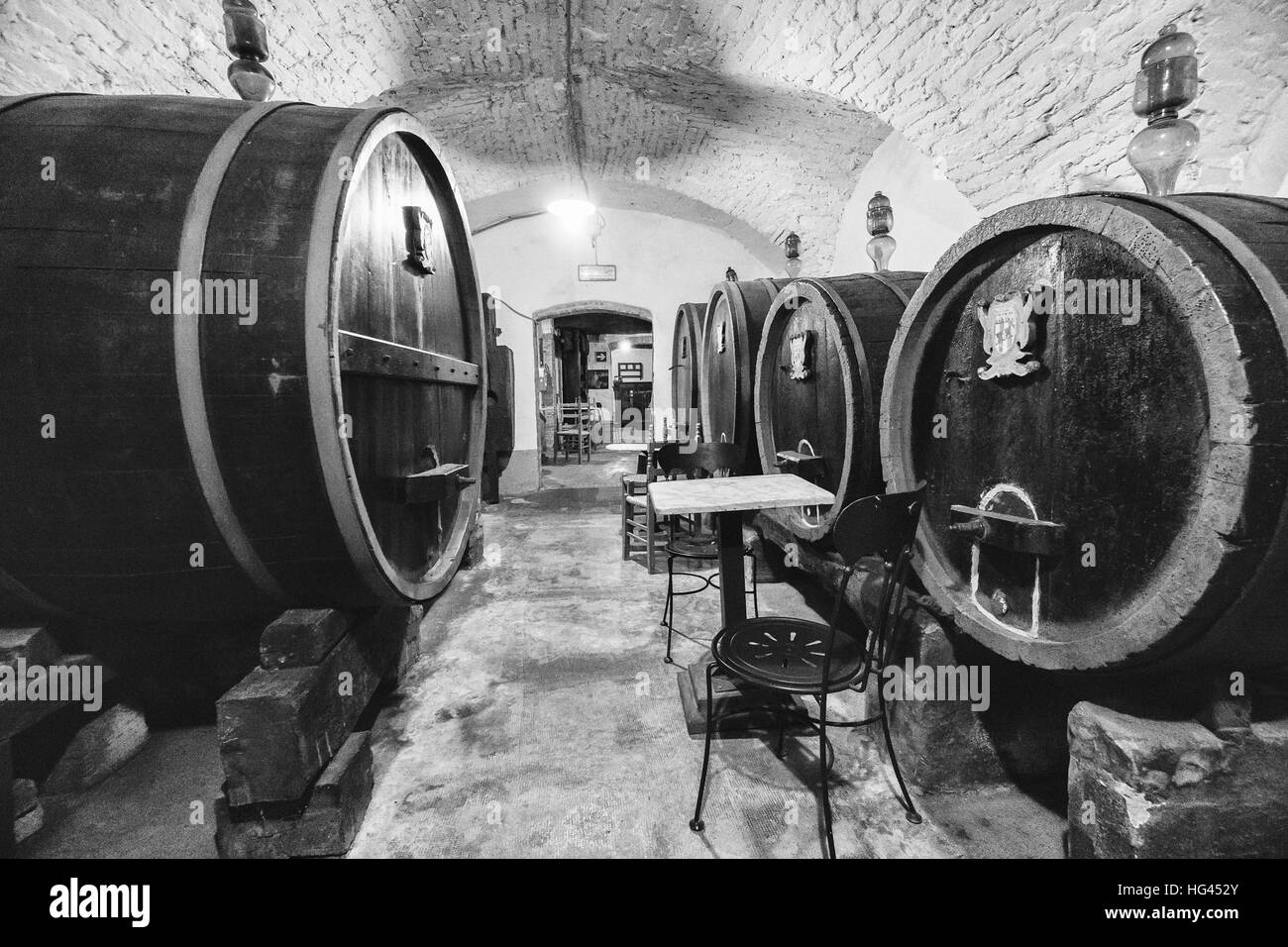 Oak barrels in an old Italian wine cellar Stock Photo - Alamy
