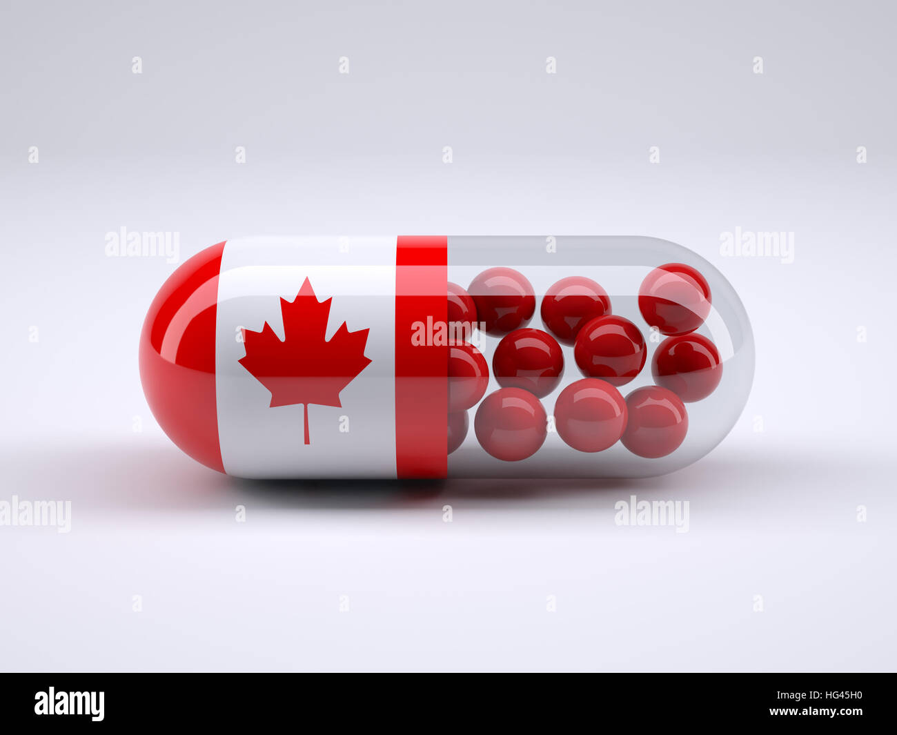 Pill with Canadian flag wrapped around it and red ball inside, 3d ...