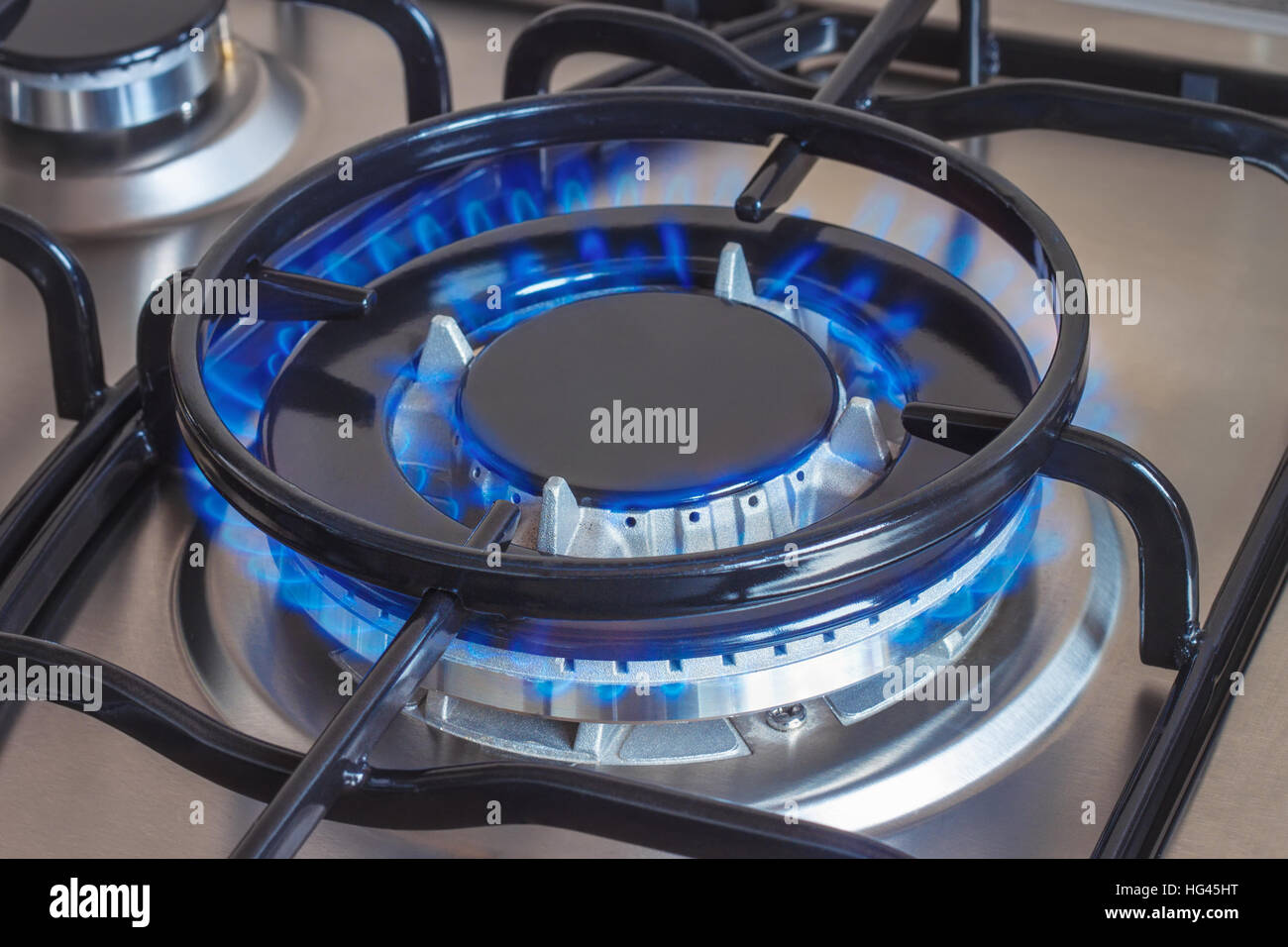 Closeup of burning gas turbo burner of stove Stock Photo - Alamy