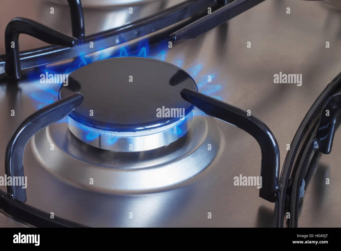 burner with burning gas on the kitchen gas stove Stock Photo - Alamy