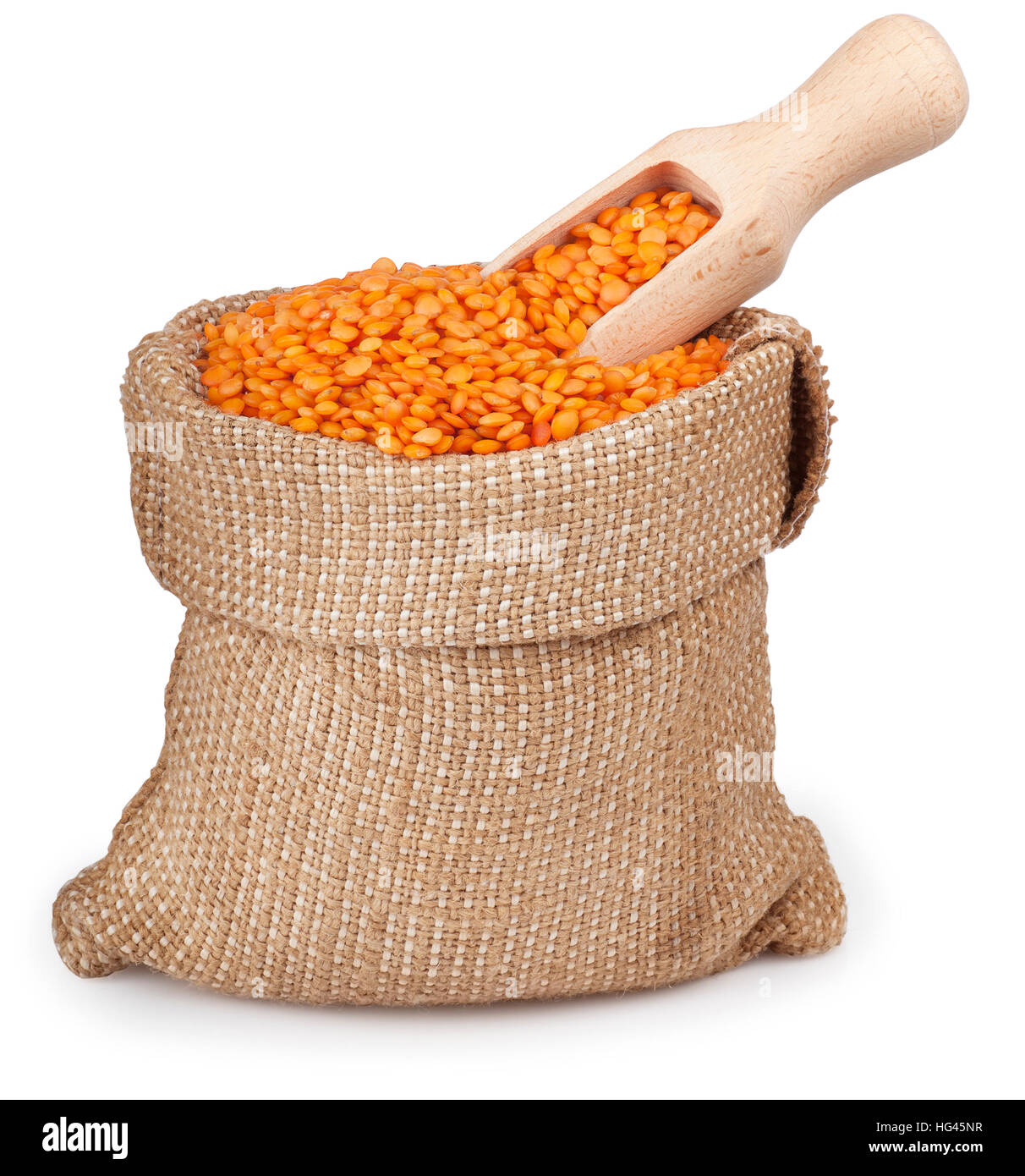 red lentils in burlap bag with wooden scoop isolated on white ...