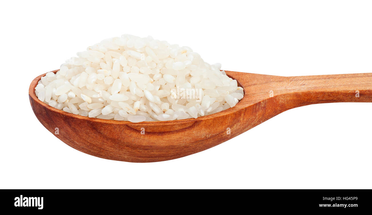 Rice in wooden spoon isolated on white background Stock Photo - Alamy