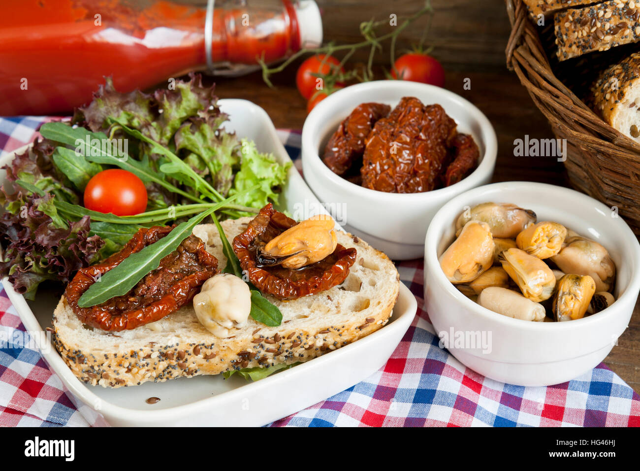 Sandwich with sun-dried tomatoes and arugula, sun-dried tomatoes, fresh ...
