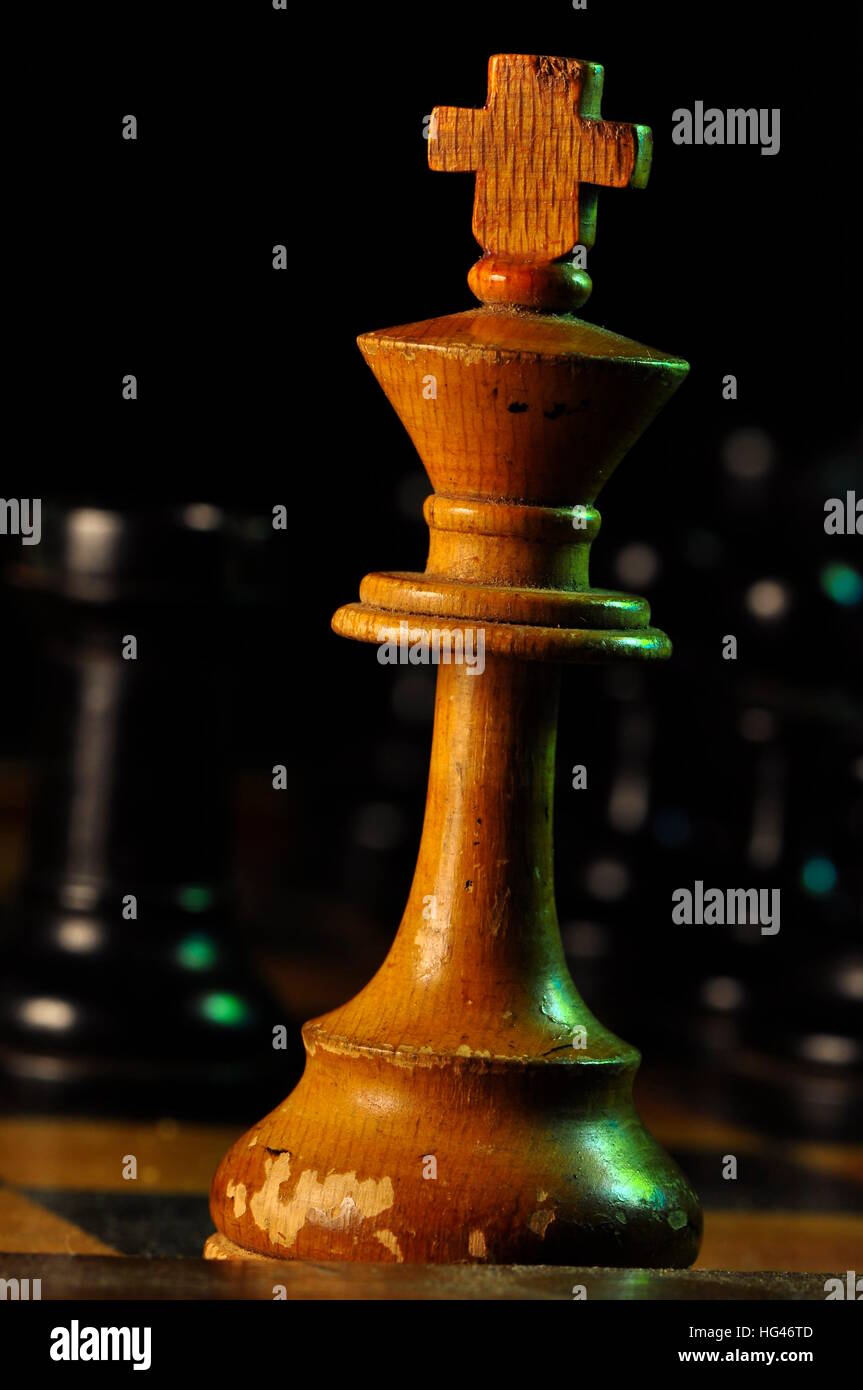 Close-up King in check by the tower on black background Stock Photo - Alamy