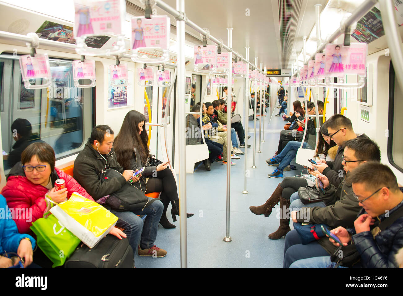 Asian man asian woman inside train hi-res stock photography and images ...