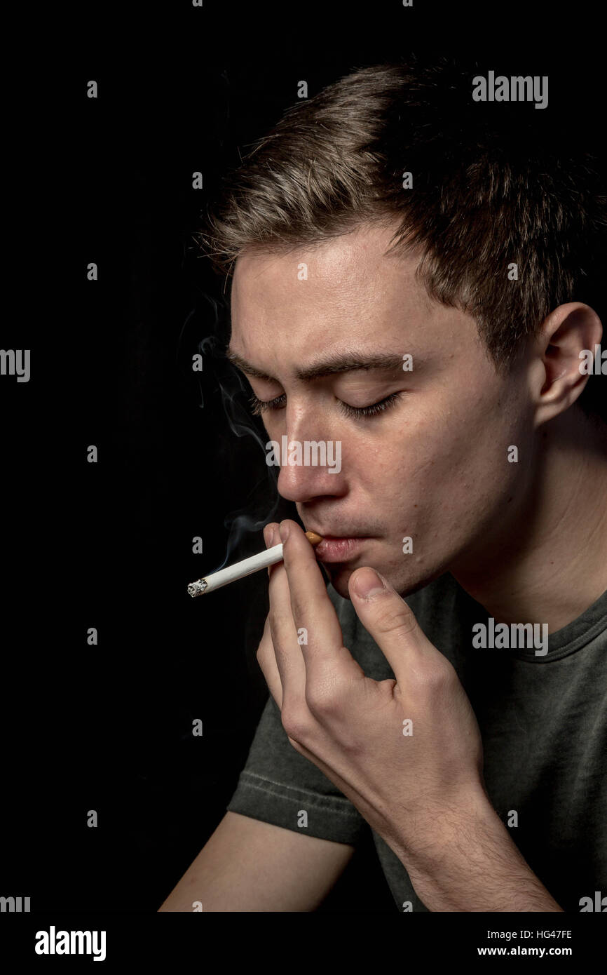 Boy smoking hi-res stock photography and images - Alamy