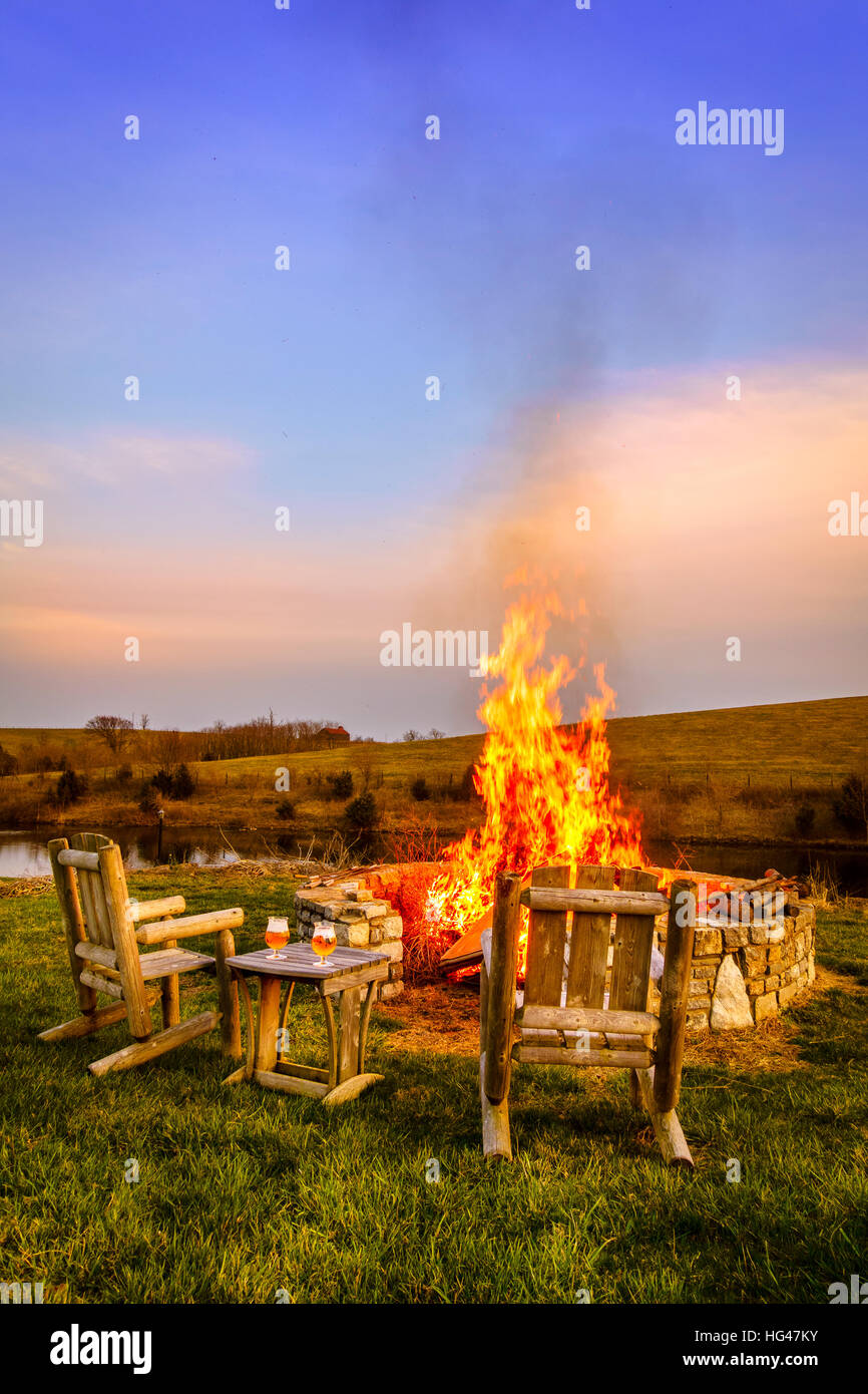 Bonfire in a firepit at sunset in Central Kentucky countryside near ...