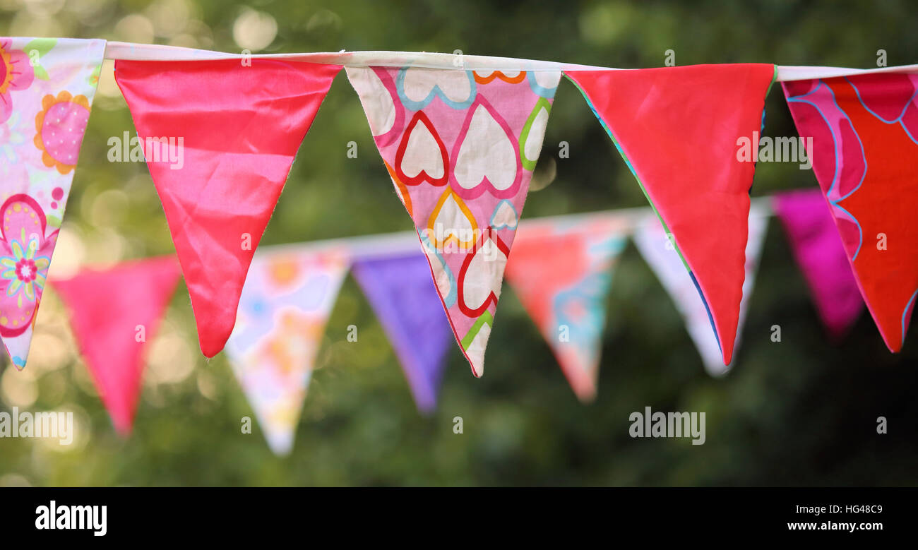 Multi colored bunting hanging hi-res stock photography and images - Alamy