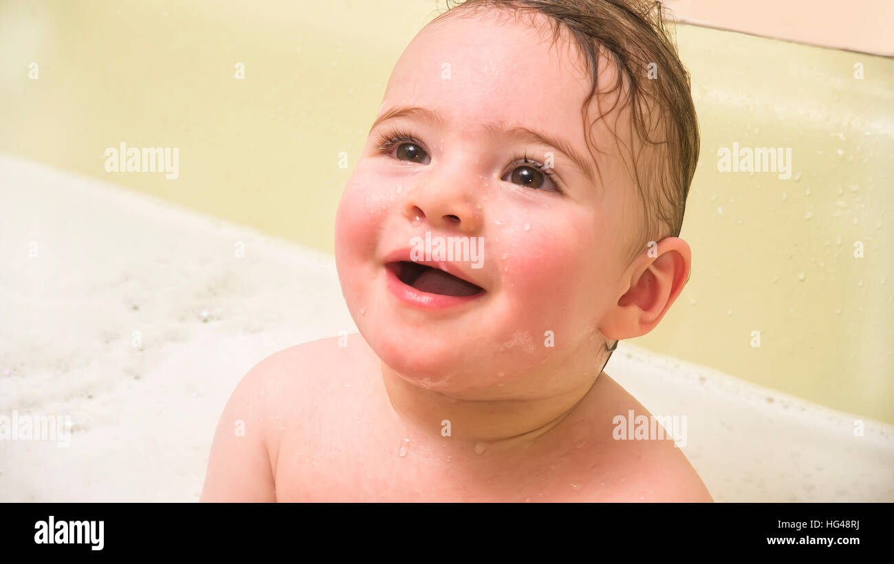 Baby with smile hi-res stock photography and images - Alamy
