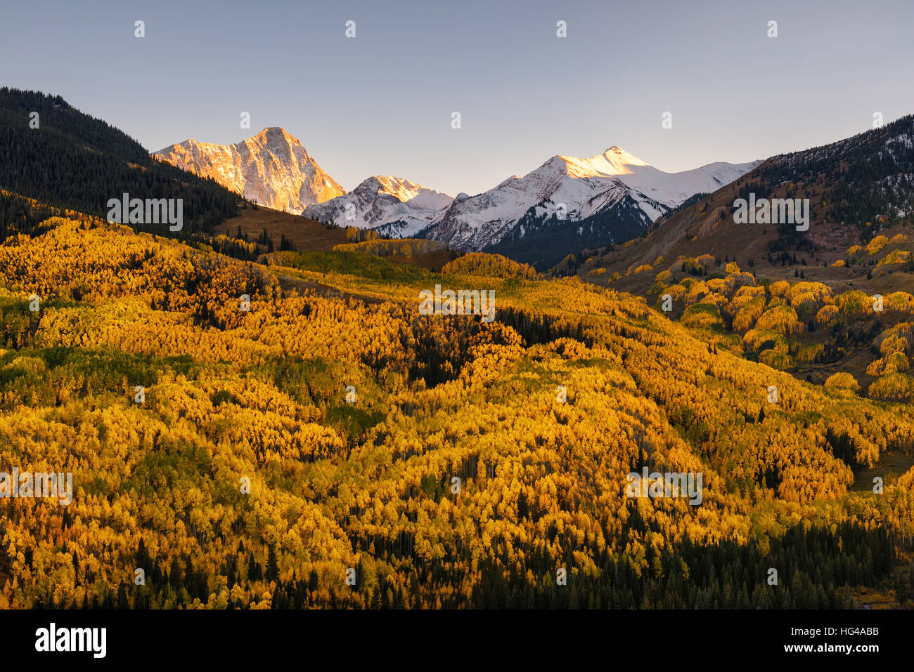 Fall foliage color and big mountain with snow on top. Capital Peak ...