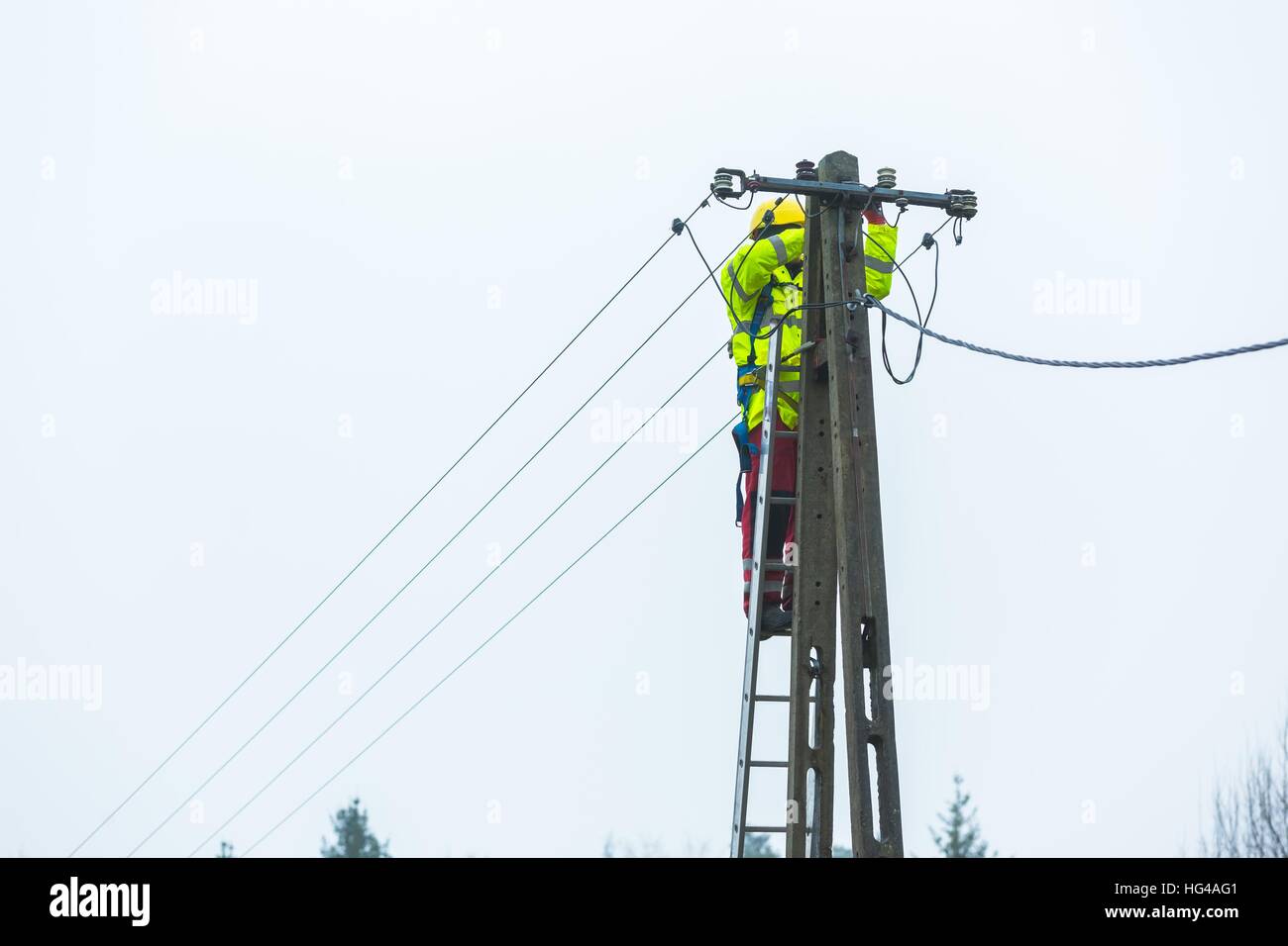 Electrician working on power lines. Failure of power lines on power ...