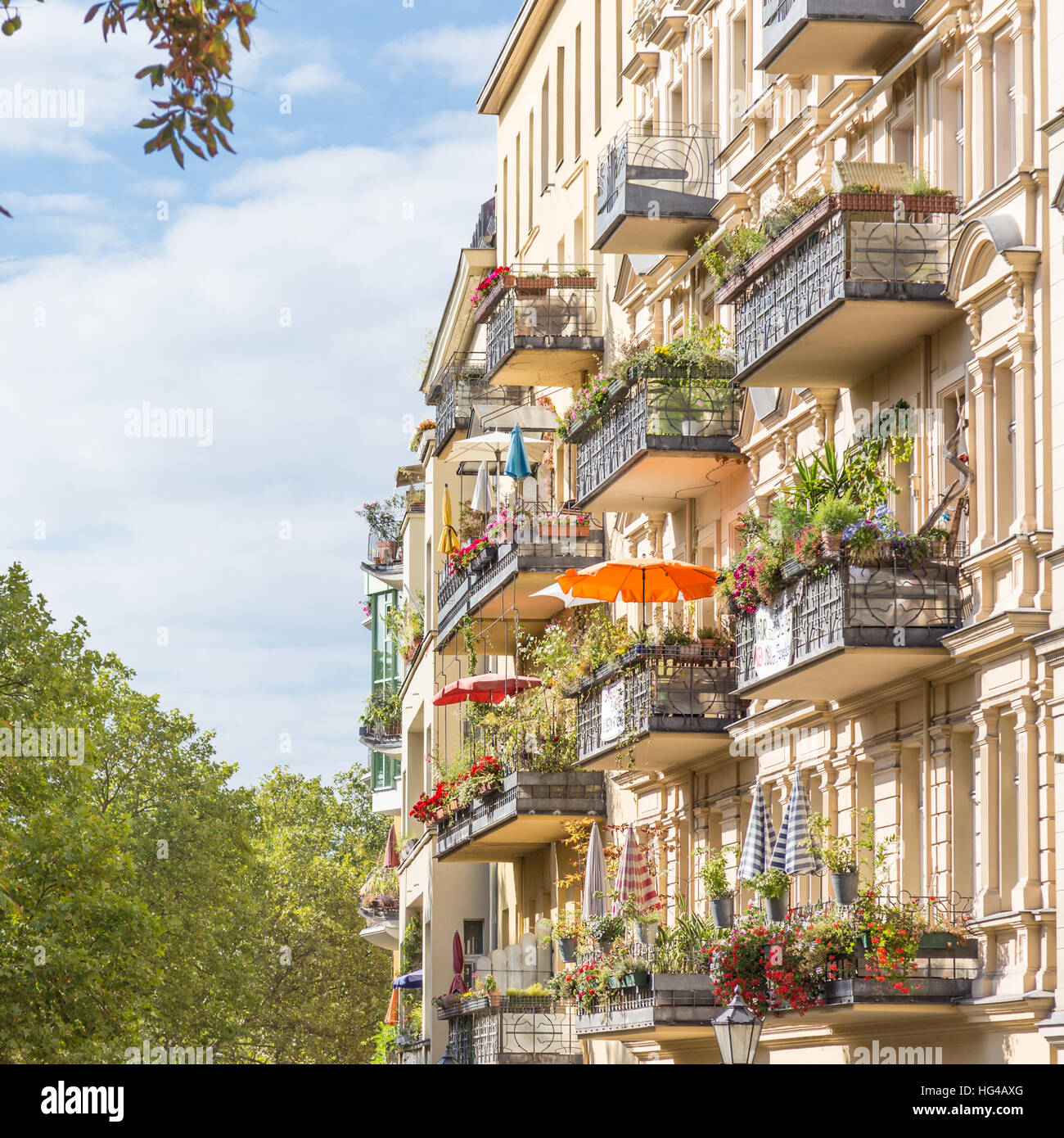 Traditional European Balcony with colorful flowers and flowerpots Stock ...