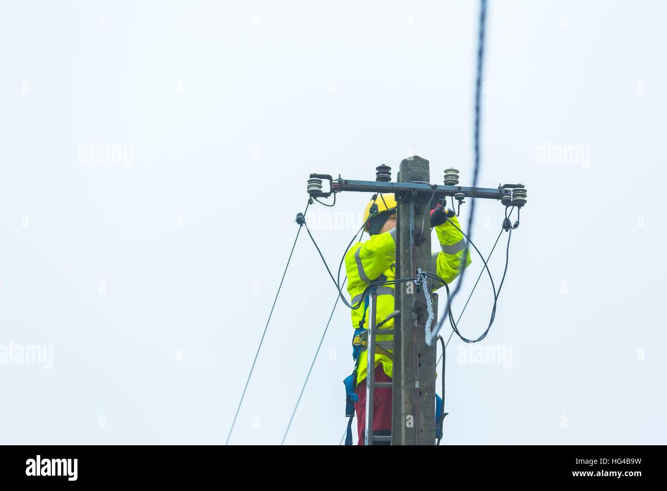 Electrician working on power lines. Failure of power lines on power ...