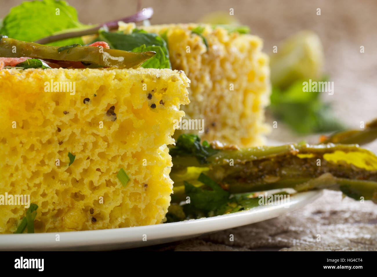 Traditional Gujarati snack Dhokla Stock Photo - Alamy