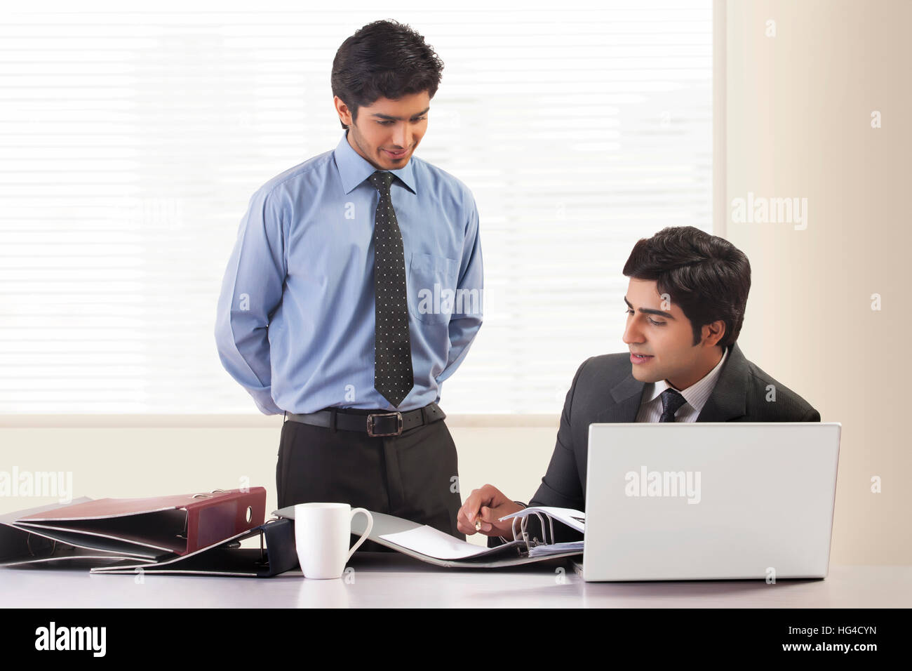 Businessmen working together using hi-res stock photography and images ...