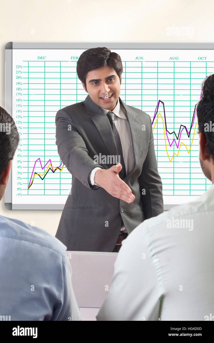 Businessman extending hand for handshake Stock Photo - Alamy