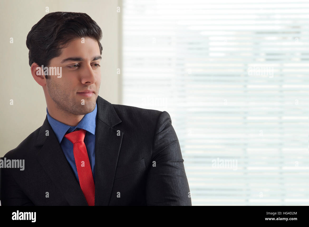 Portrait of young businessman Stock Photo - Alamy