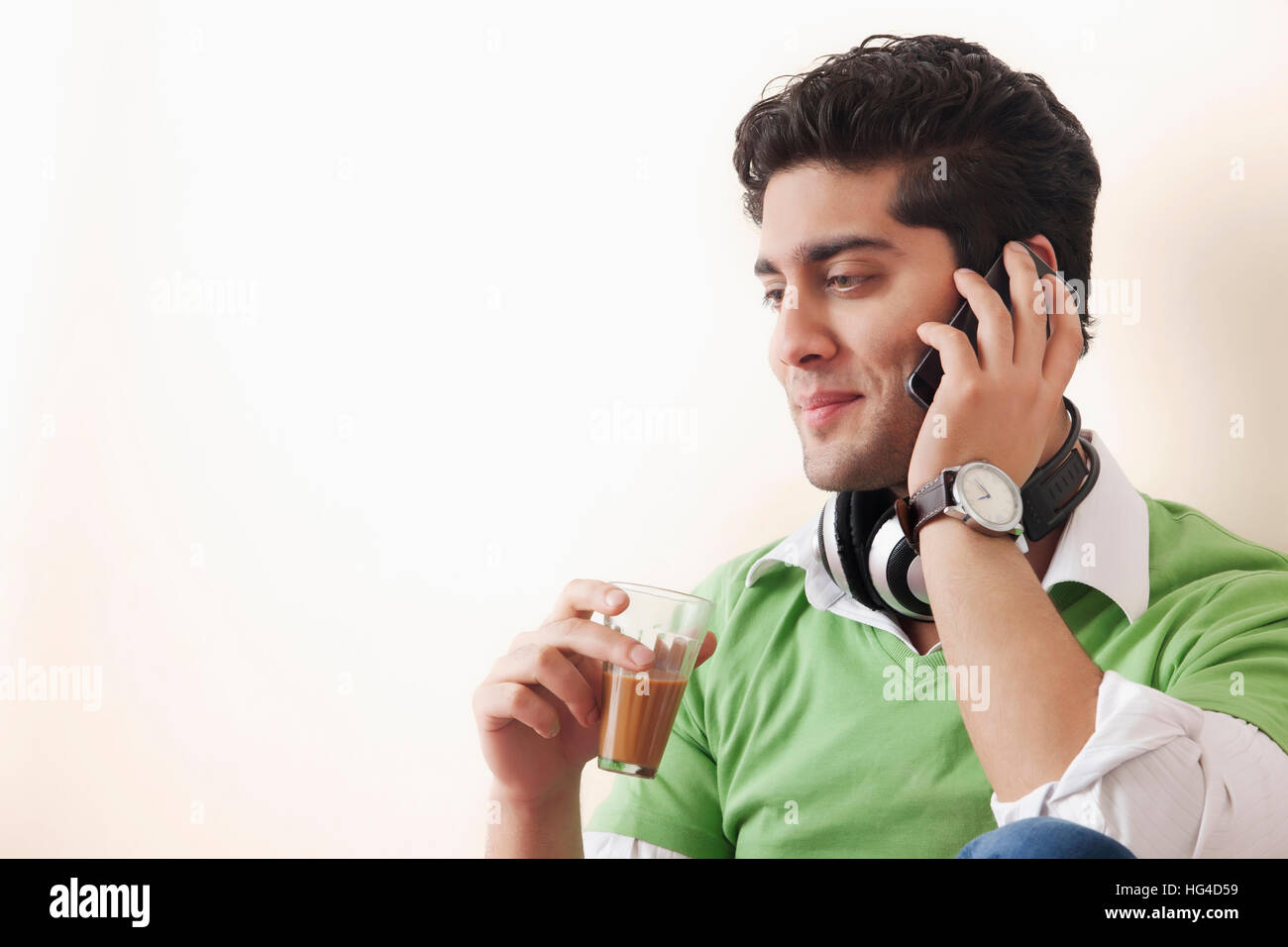 Portrait of indian man drinking chai hi-res stock photography and ...