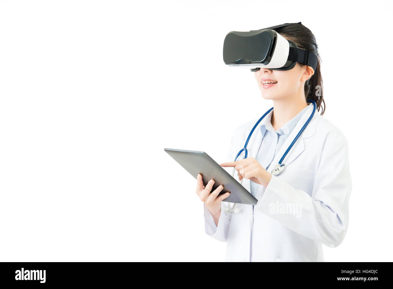 asian female doctor use digital tablet control virtual reality. VR ...