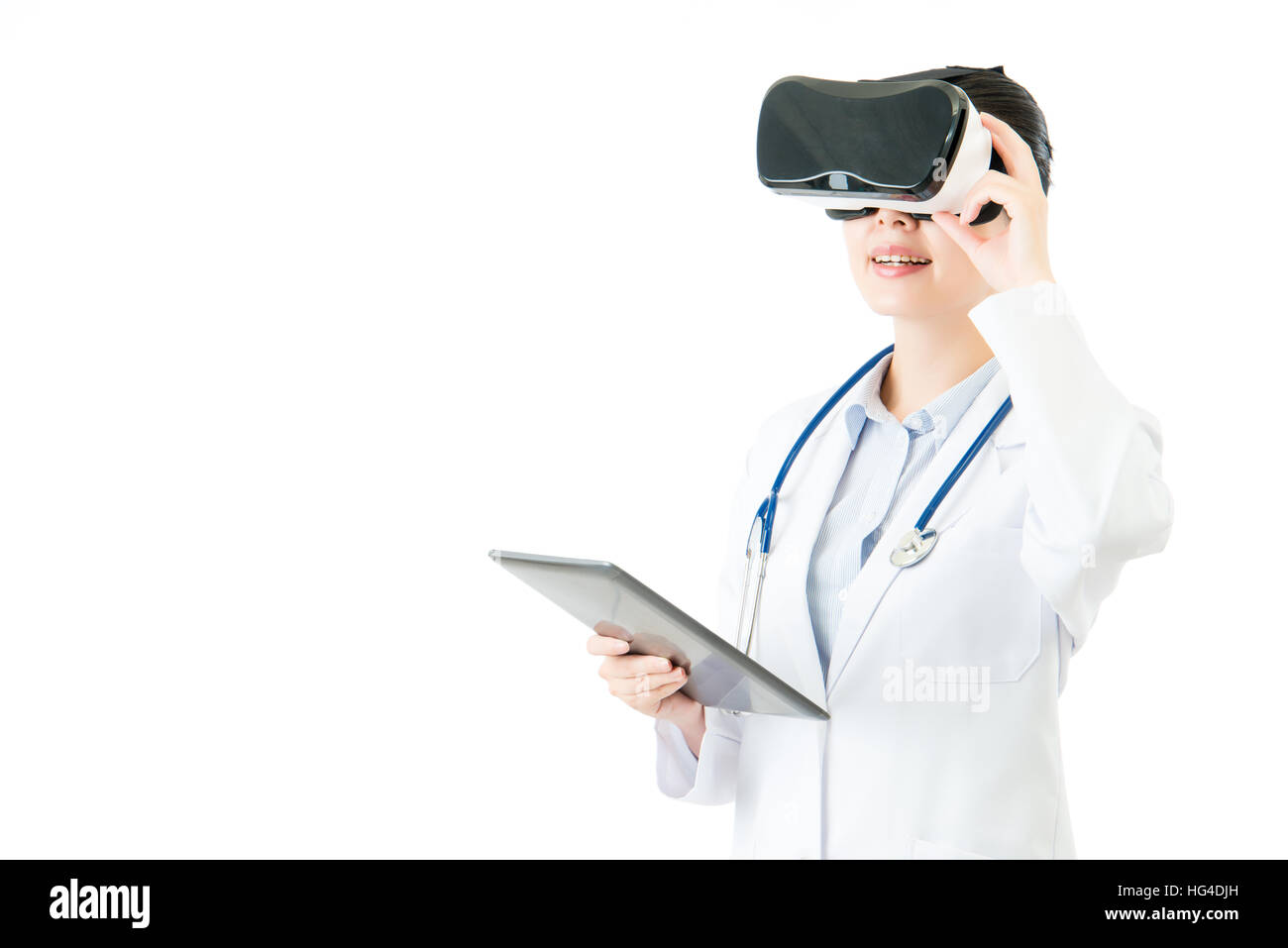 asian female doctor use digital tablet control virtual reality. VR ...