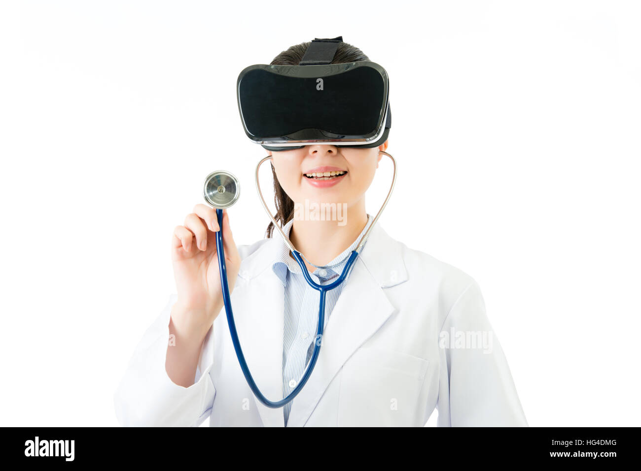 asian female doctor use stethoscope with virtual reality. VR headset ...