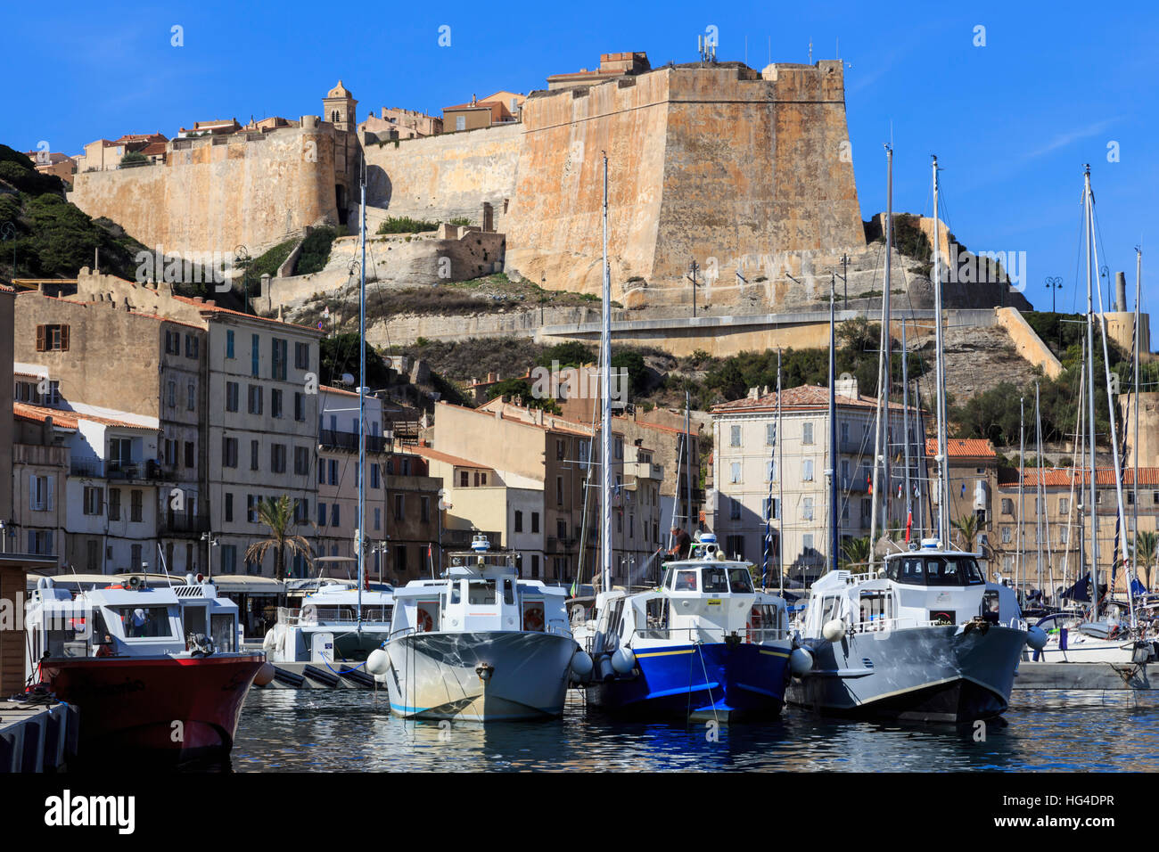 Old citadel view with yachts in the marina, Bonifacio, Corsica, France ...
