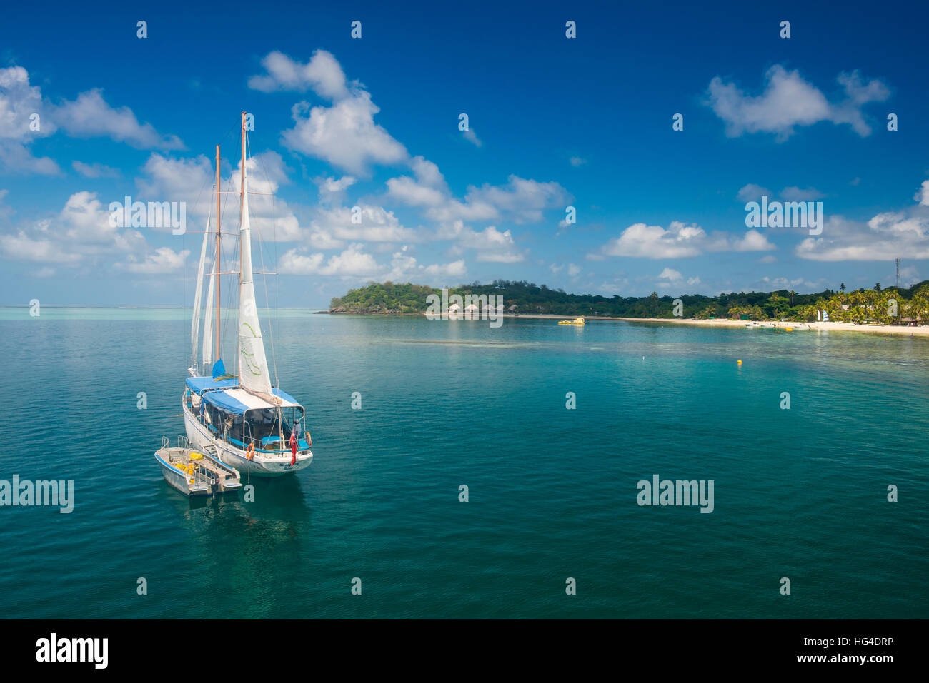 Sailing boat anchoring on Mana Island, Mamanuca Islands, Fiji, South ...