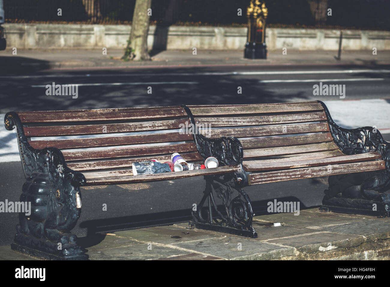 pile of garbage gathered on a bench Stock Photo - Alamy