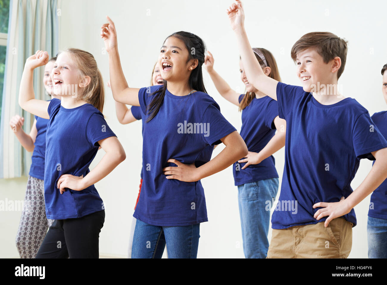 Group Of Children Enjoying Drama Class Together Stock Photo - Alamy