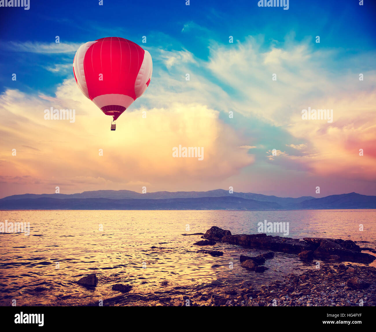 Hot air balloon over sea hi-res stock photography and images - Alamy