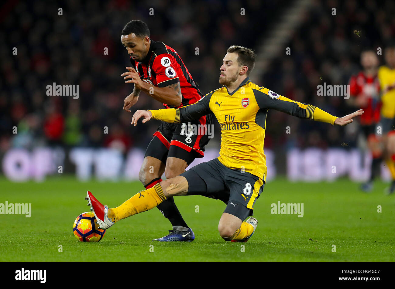 AFC Bournemouth's Callum Wilson (left) and Arsenal's Aaron Ramsey ...