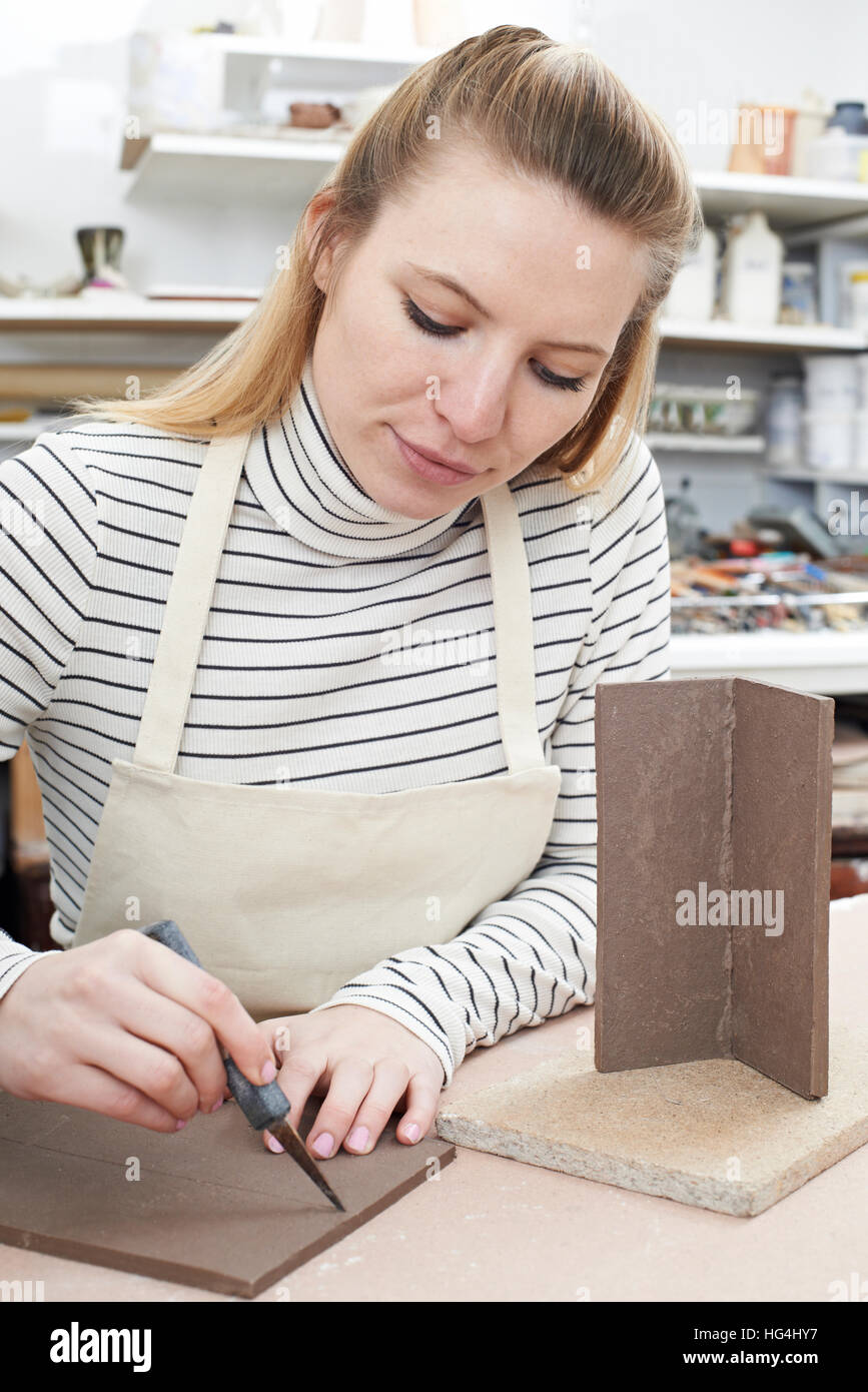 Young Woman Making Pot in Ceramics Studio Stock Photo - Alamy
