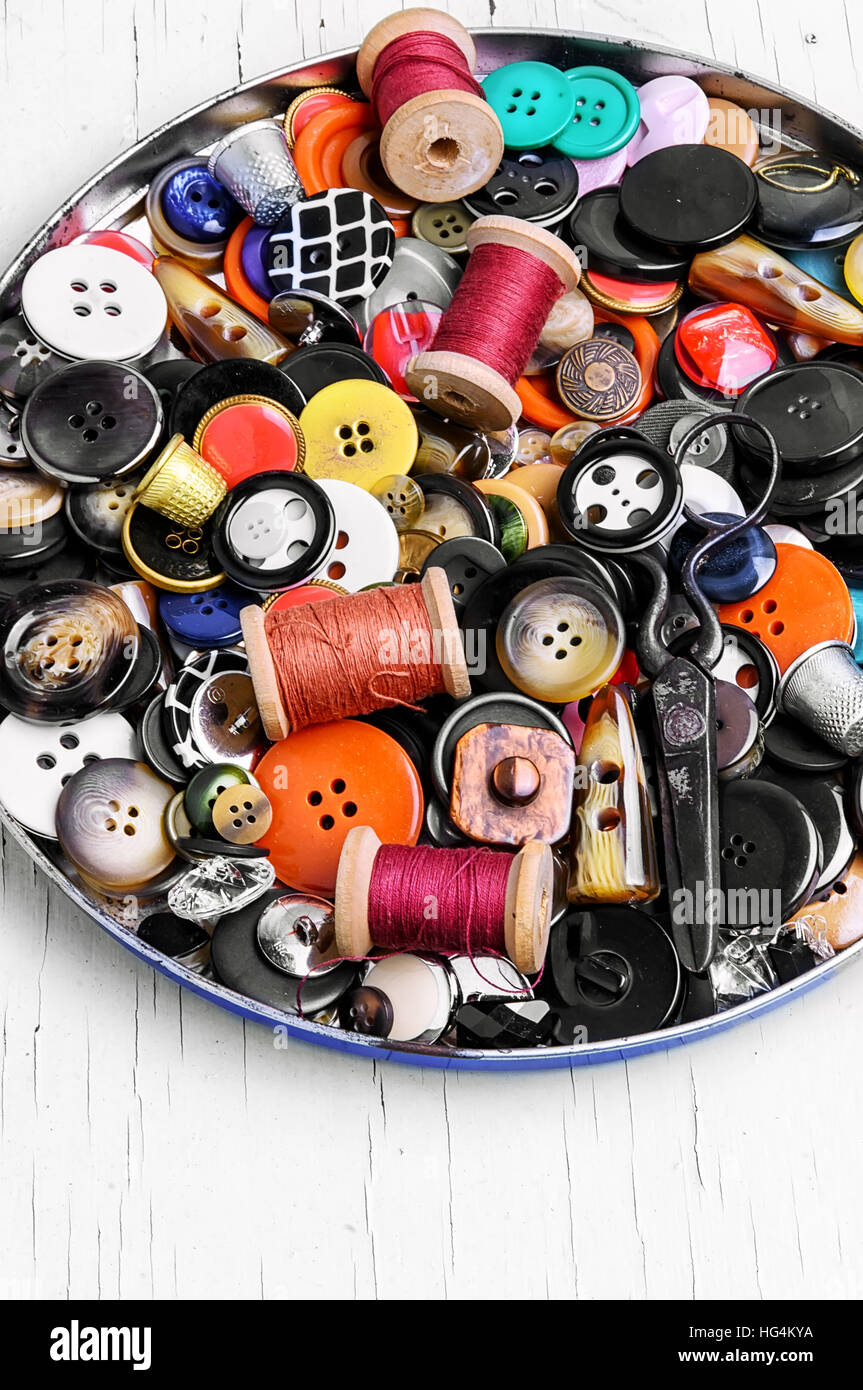 Threads for sewing and set of buttons from clothing Stock Photo - Alamy