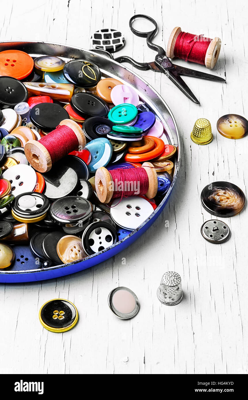 Threads for sewing and set of buttons from clothing Stock Photo - Alamy