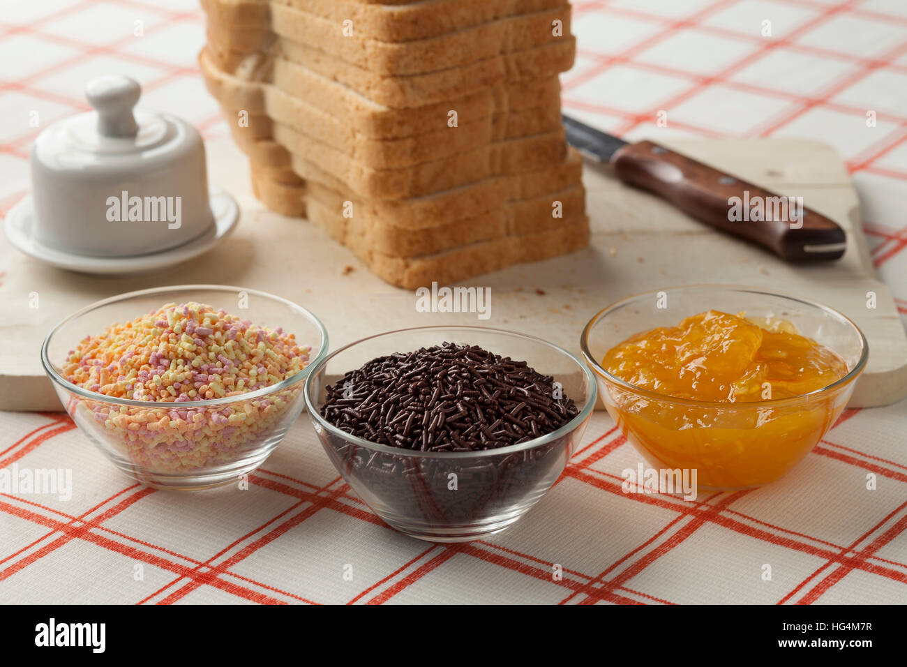 Assorted traditional dutch sweets and slices of bread for breakfast ...