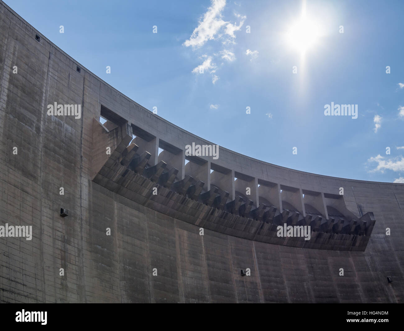 Wall, overflow and sun at impressive Katse Dam hydroelectric power ...