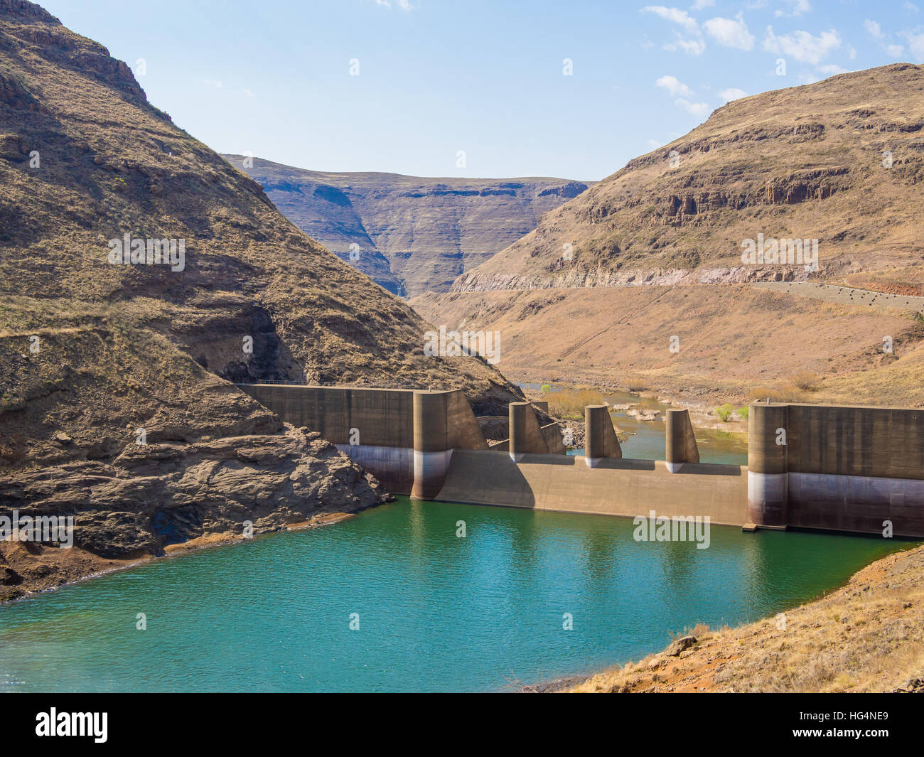 Downriver view of gorge and breakers at impressive Katse Dam ...