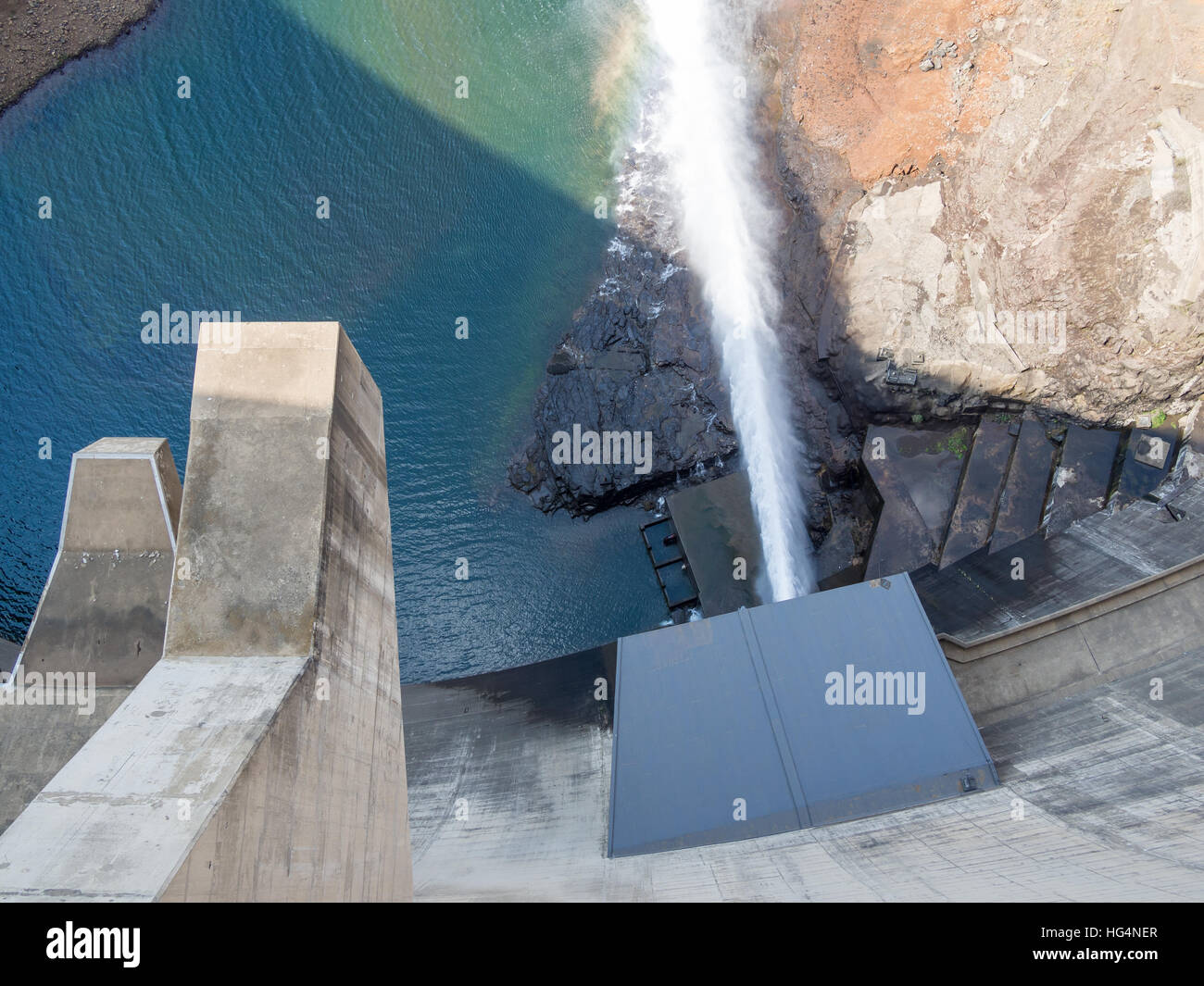 Top view of release of water at impressive Katse Dam hydroelectric ...