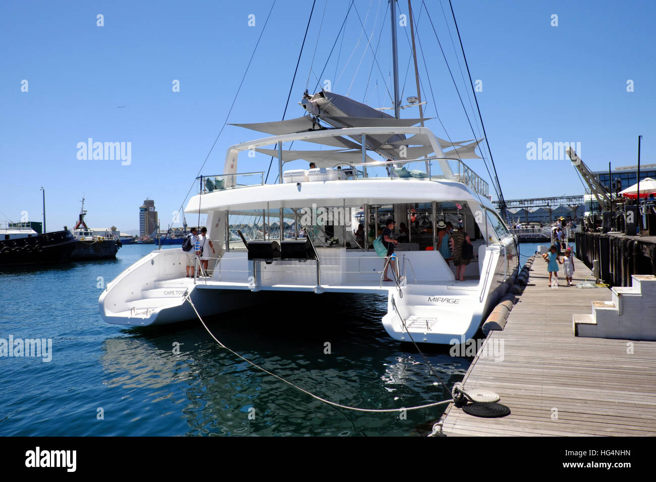 The stern of a luxury catamaran taken from the wharf in Cape Town ...