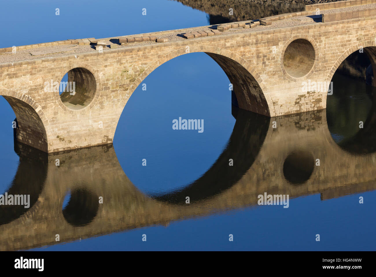 Bridge water reflection Stock Photo - Alamy
