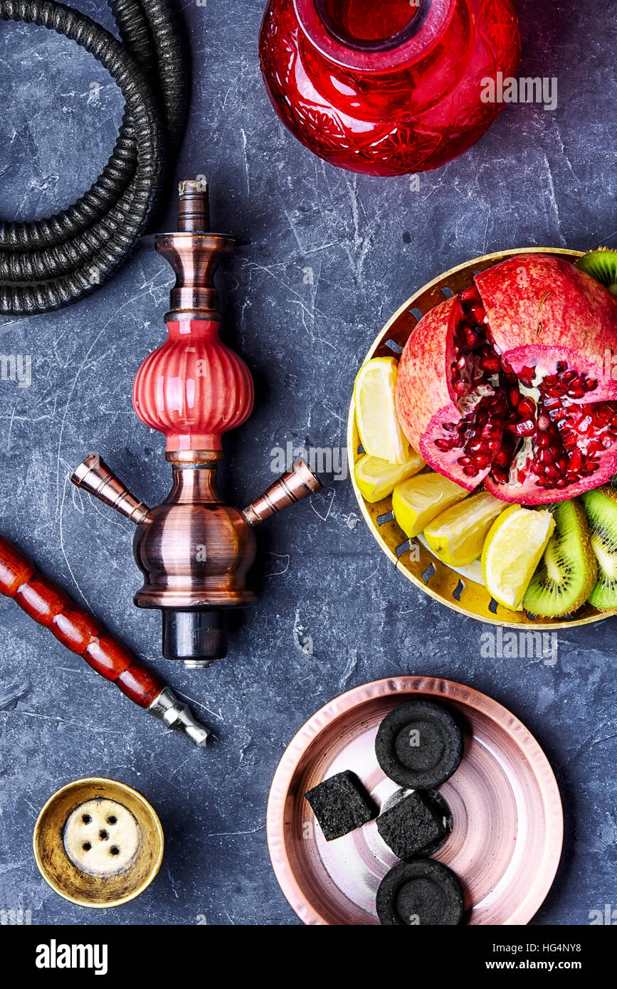 smoking hookah and dish with kiwi,pomegranate and lime Stock Photo - Alamy