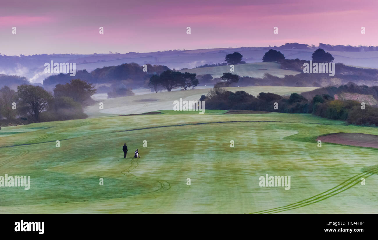 A beautiful golf course with dramatic sky near the sea Stock Photo - Alamy