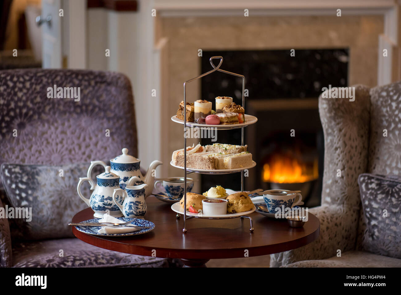 A Devon or Cornish cream tea with cakes and sandwiches Stock Photo - Alamy