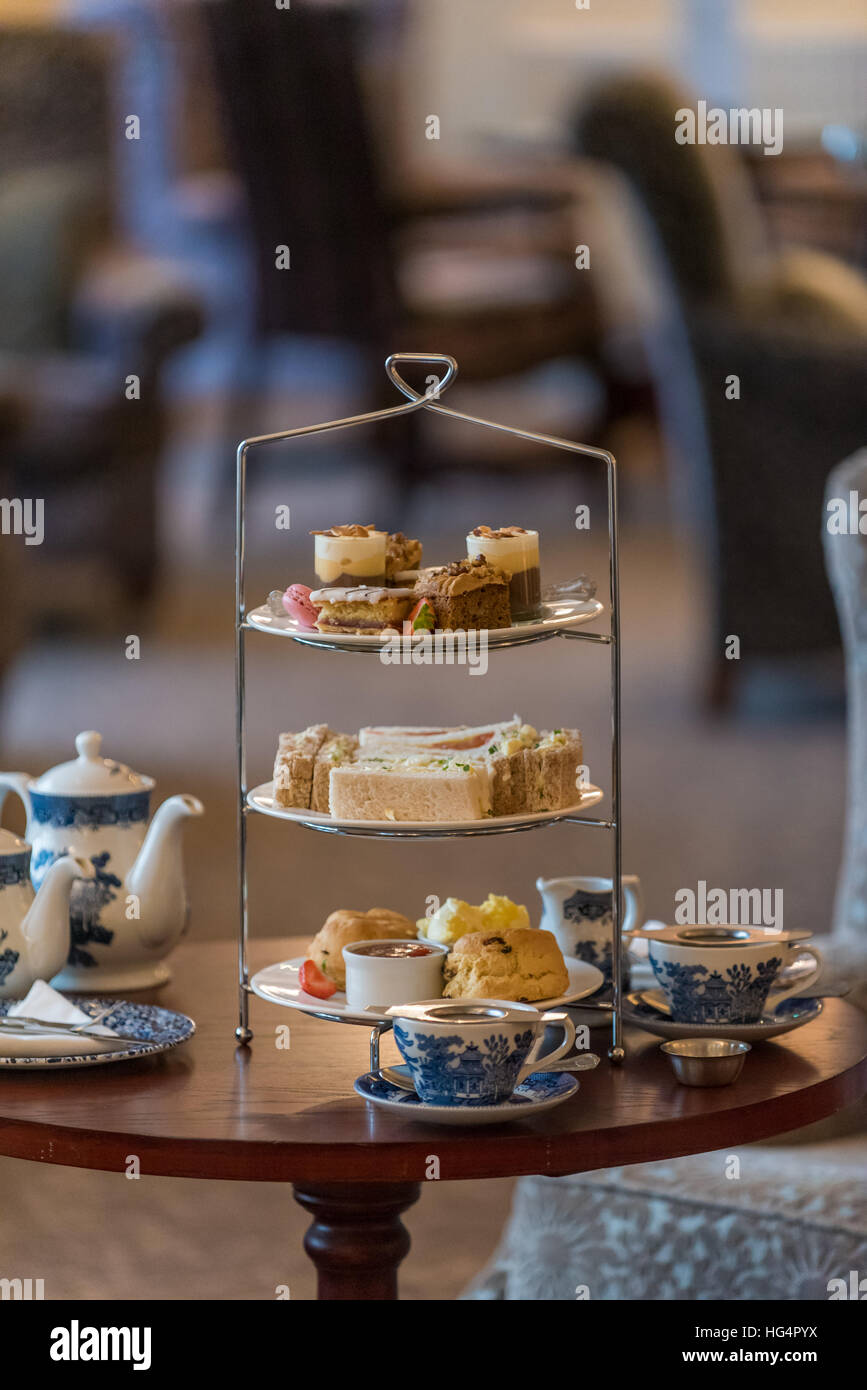 A Devon or Cornish cream tea with cakes and sandwiches Stock Photo - Alamy